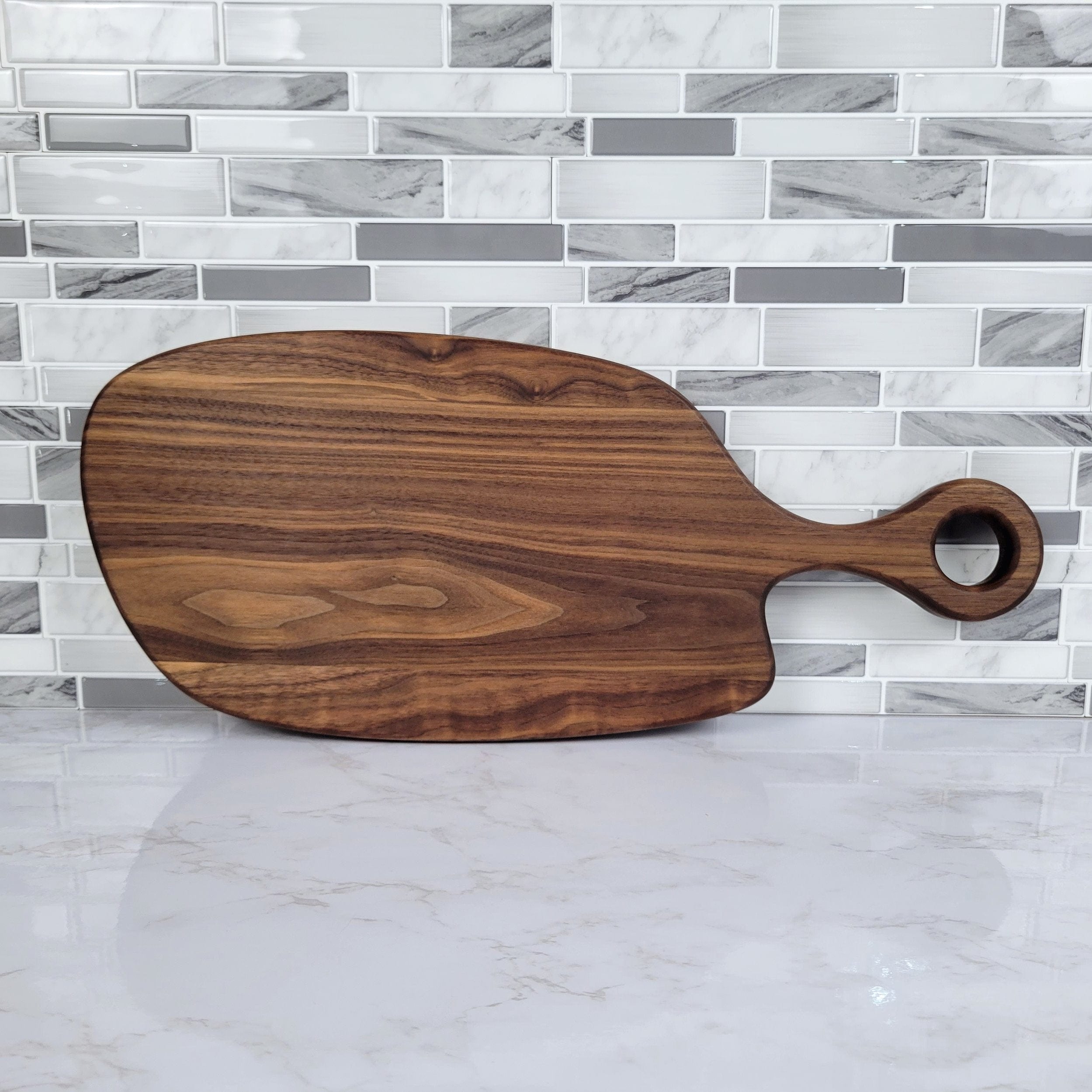 Black Walnut Charcuterie Board with Organic Curves and Round Handle — Wood Grain Junkie